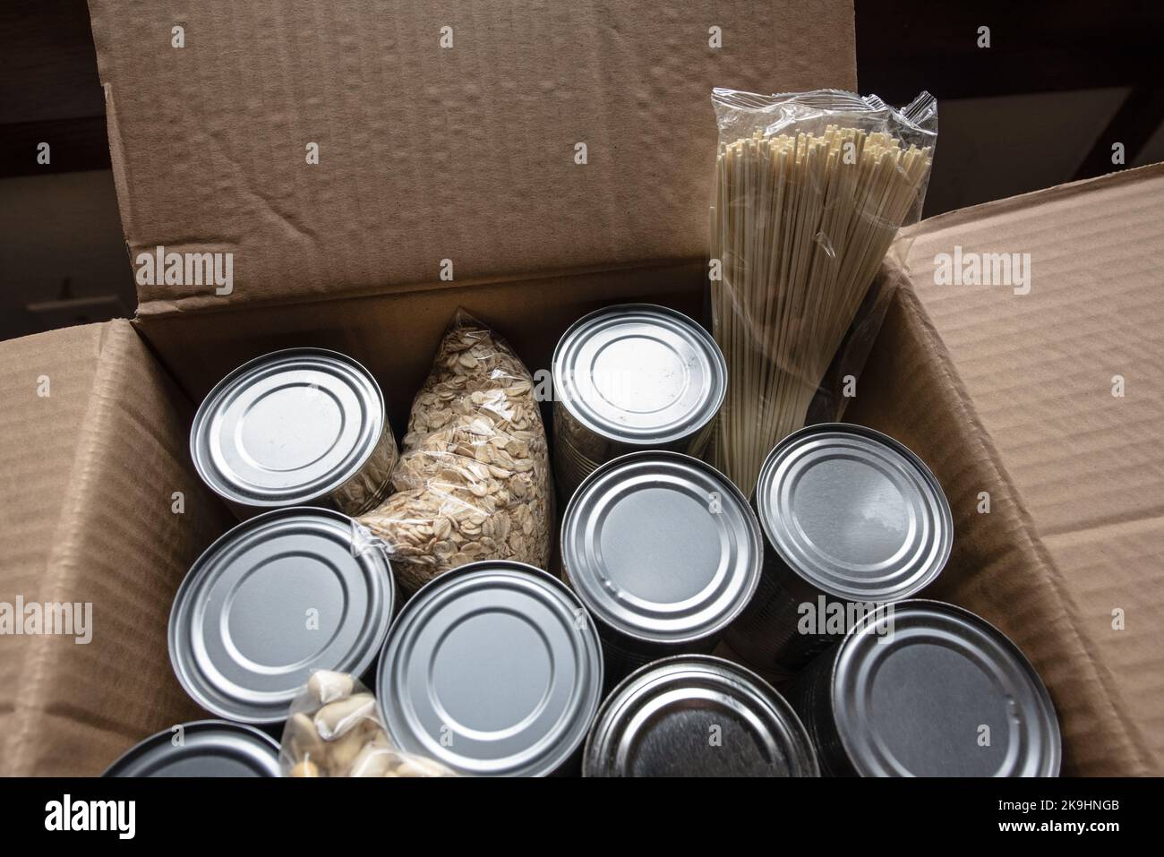 Box of canned goods and dry foods for donation Stock Photo - Alamy