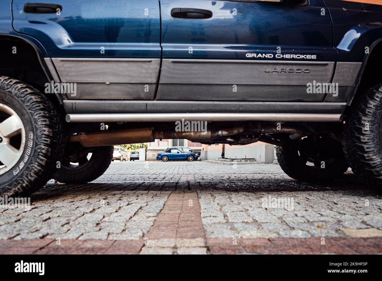 Cars with High and Low Ground Clearance. Two cars with low and high ...