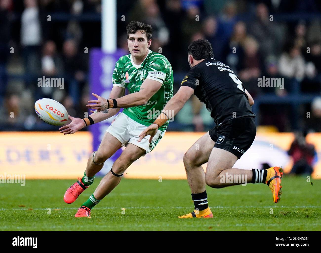 Ireland's Joshua Cook (left) and New Zealand's Brandon Smith in action ...