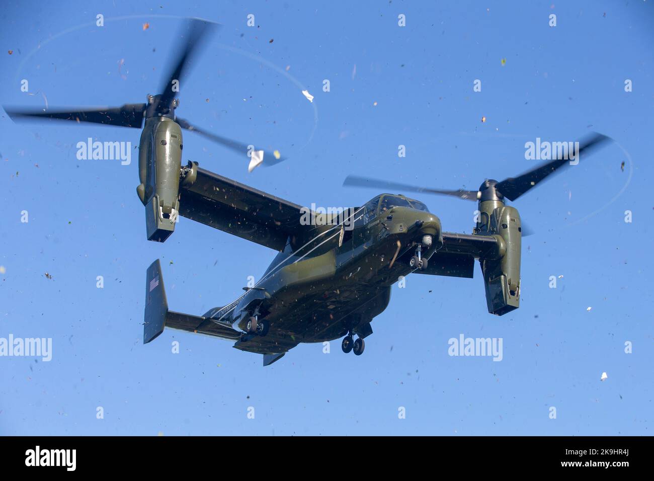 A VM-22 Osprey flies overhead for a leaflet drop during the Information ...