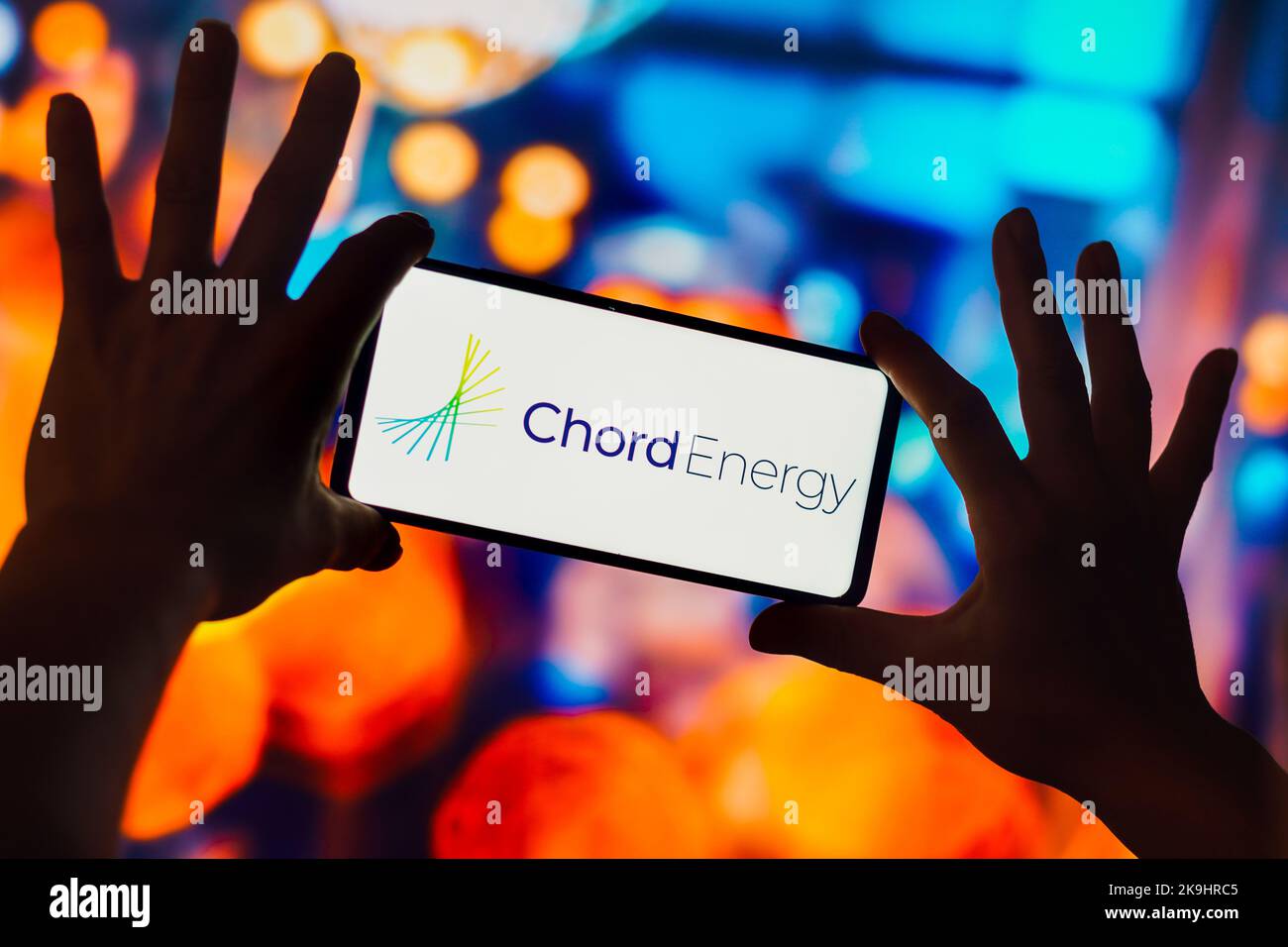 In this photo illustration, the Chord Energy Corporation logo is ...