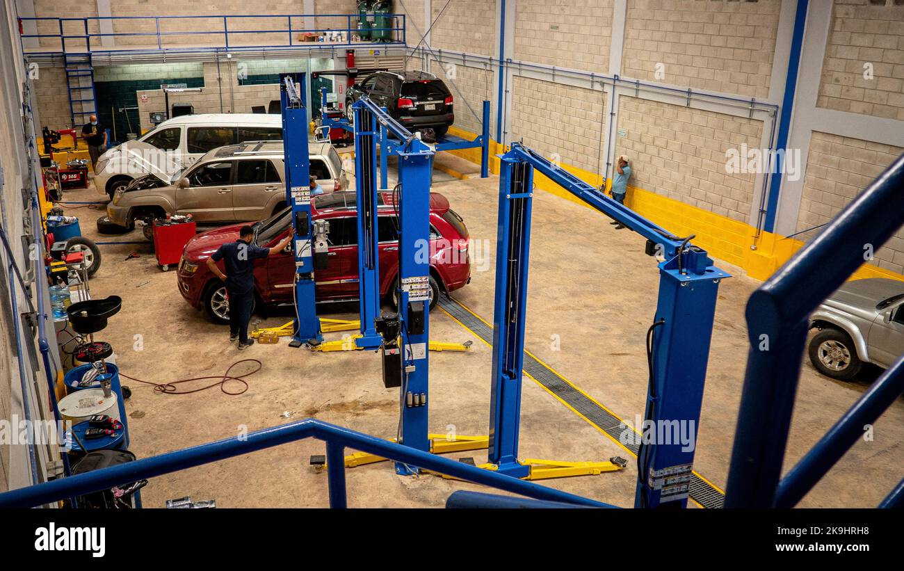 Professional mechanics workshop where automotive mechanics engineers ...