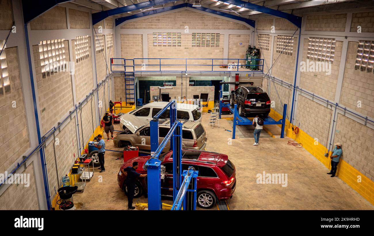 Professional mechanics workshop where automotive mechanics engineers ...