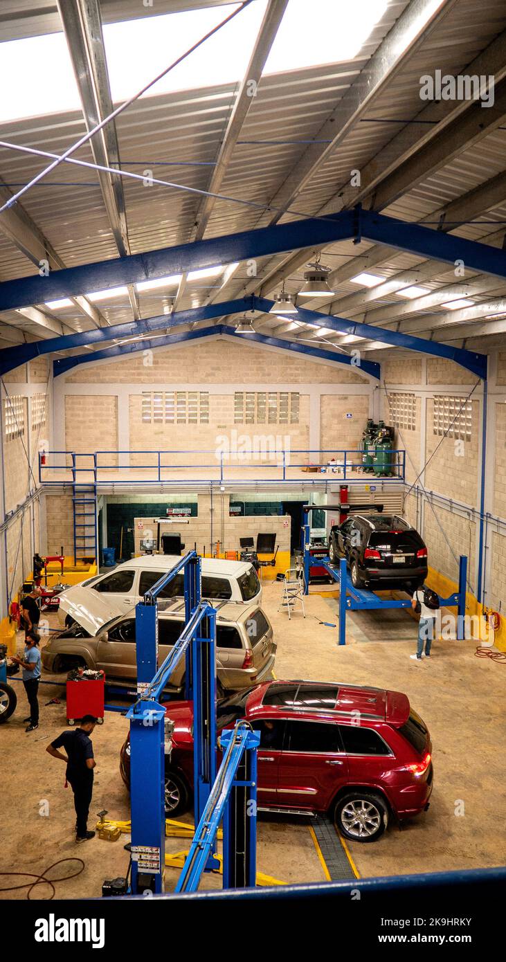 Professional mechanics workshop where automotive mechanics engineers ...