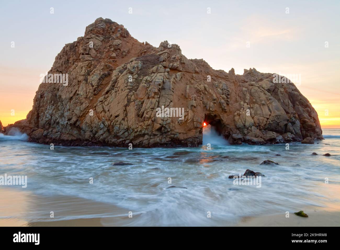 Keyhole Rock, a large, rugged rock formation with a natural archway ...