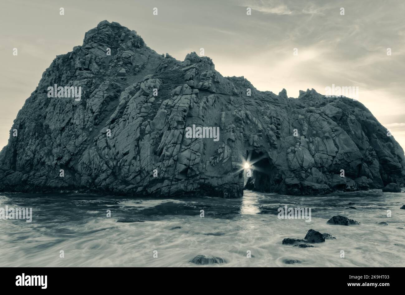 Keyhole Rock, a large, rugged rock formation with a natural archway ...
