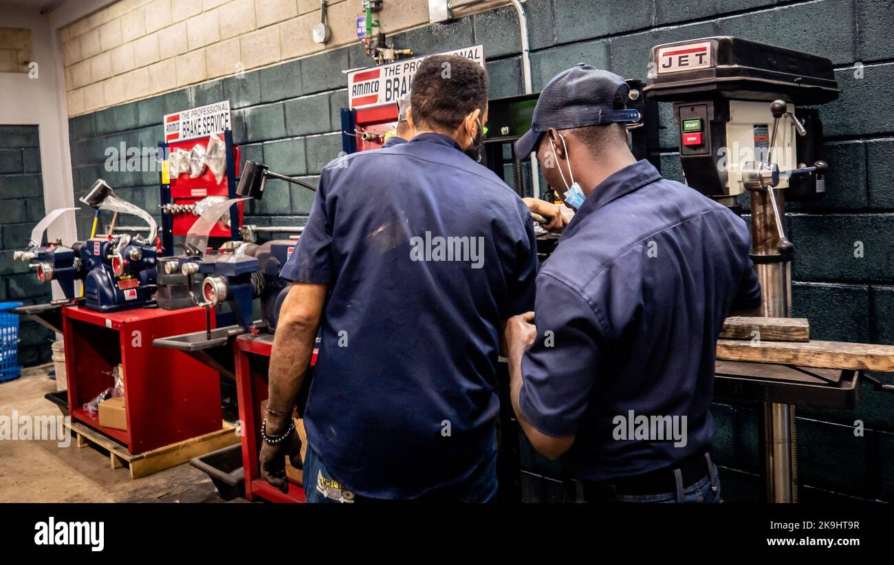 Professional mechanics workshop where automotive mechanics engineers ...