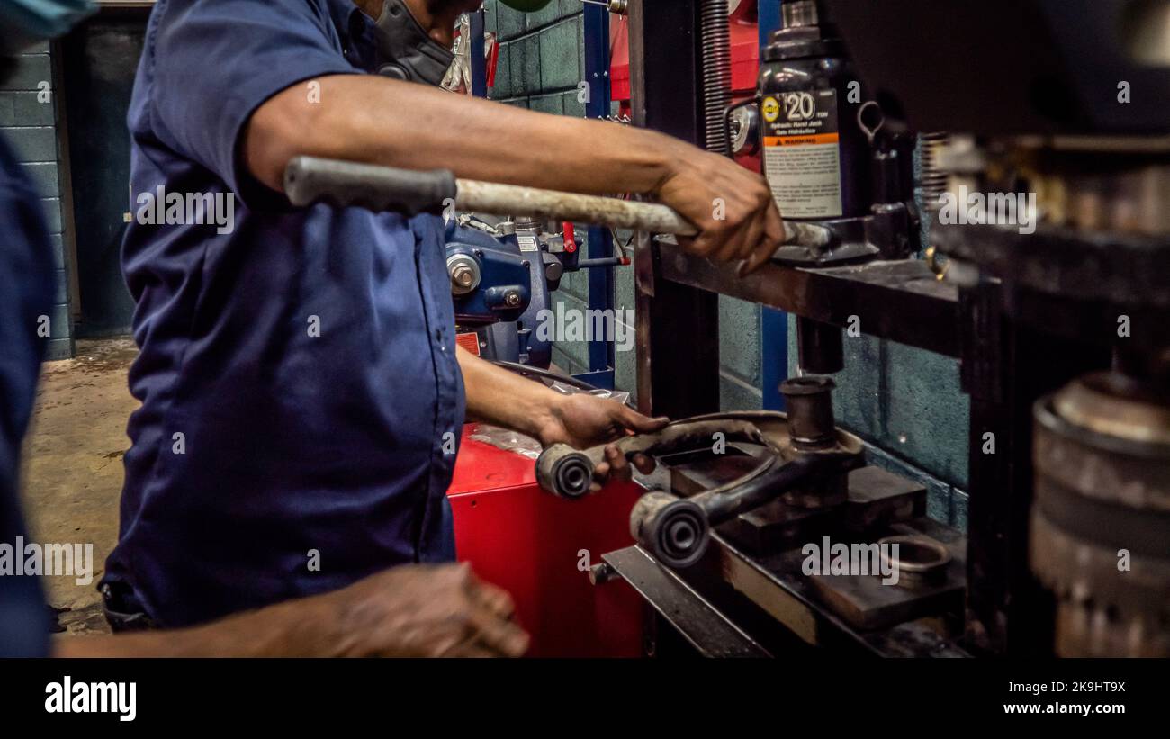 Professional mechanics workshop where automotive mechanics engineers ...