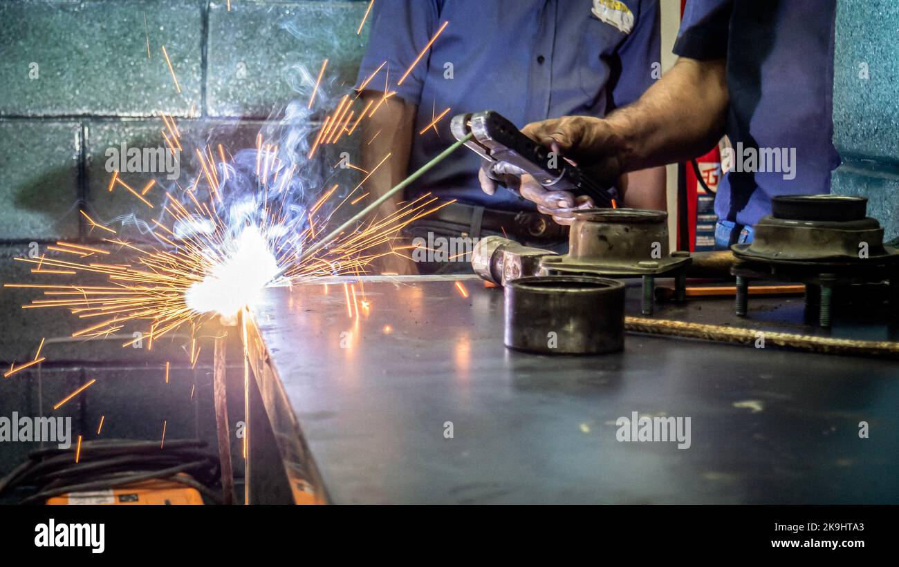 Professional mechanics workshop where automotive mechanics engineers ...