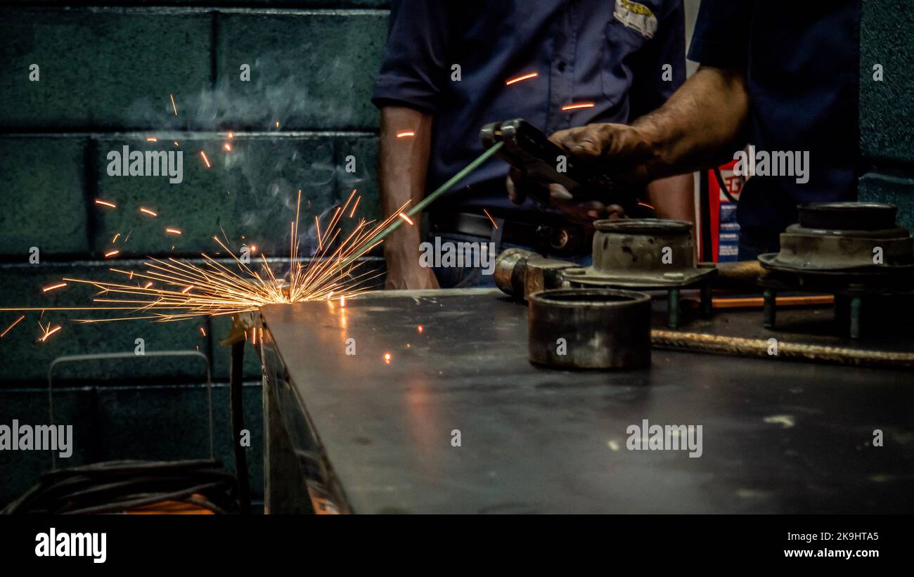 Professional mechanics workshop where automotive mechanics engineers ...