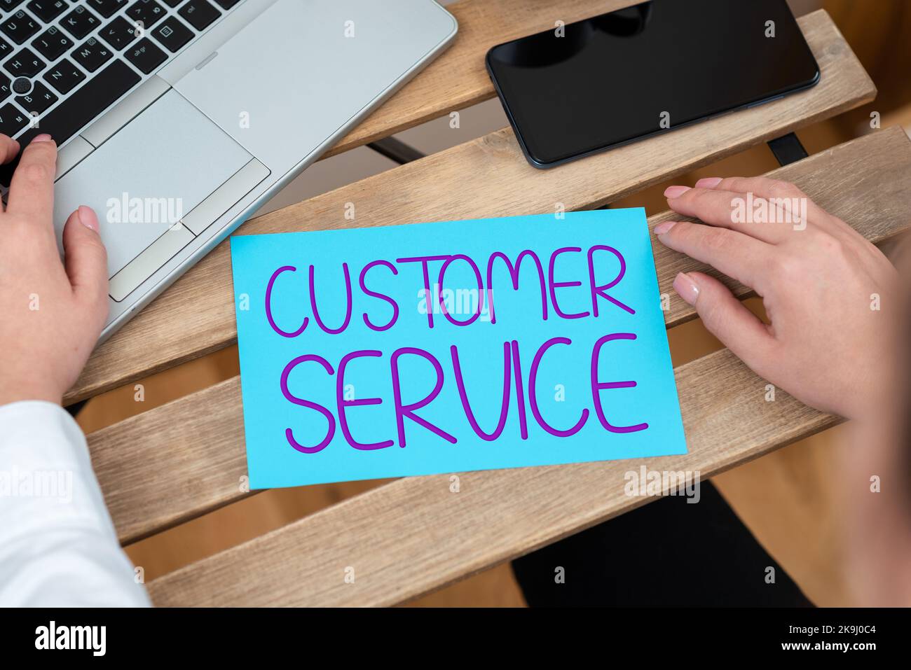 Hand writing sign Customer Service. Word for direct interaction with ...