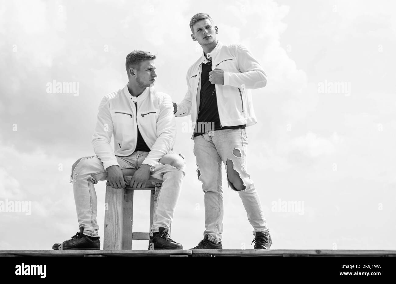 twin brothers men in white casual clothes look alike, male beauty Stock ...