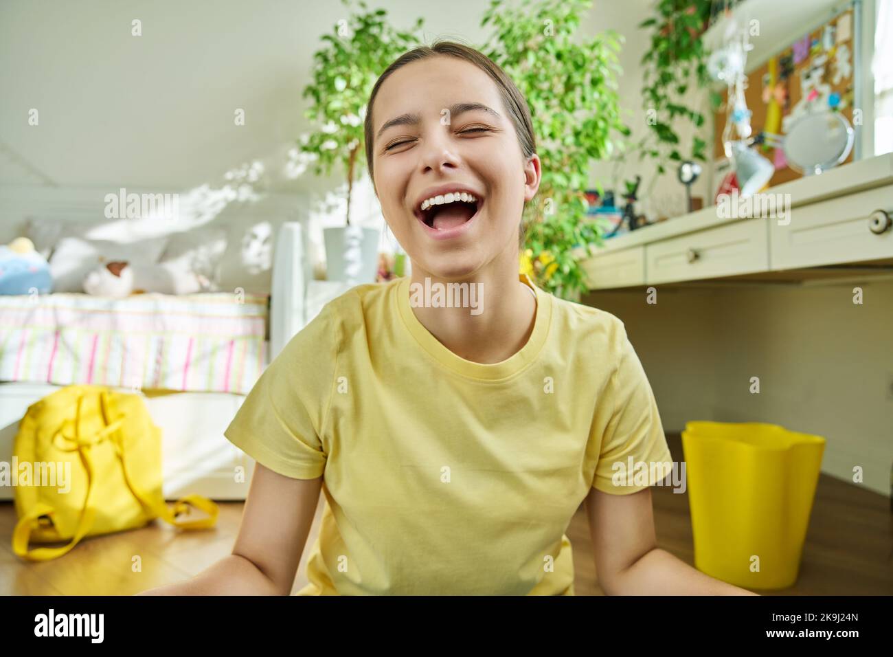 Adolescent teenage girl student having video call, looking at webcam ...