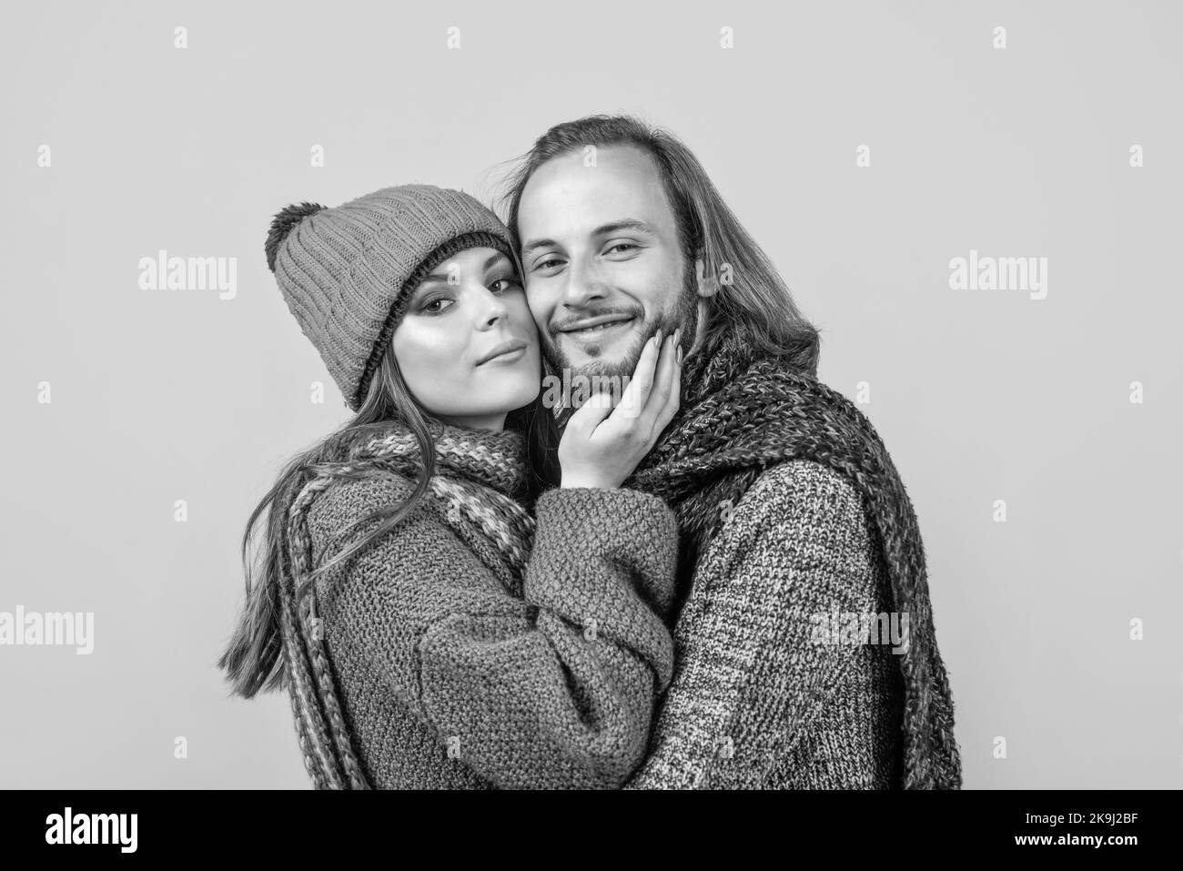 Happy loving affectionate man and woman lovers embrace yellow ...