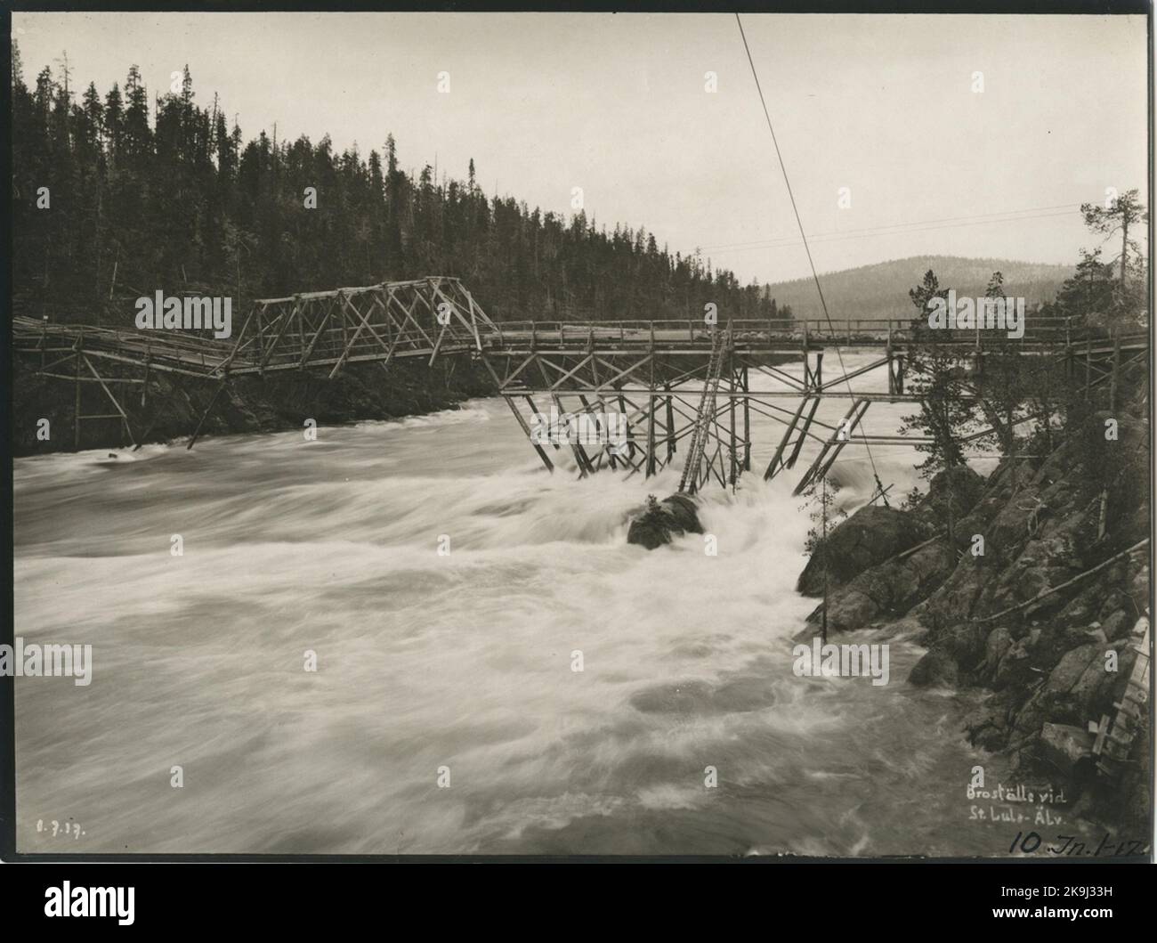 Railway bridge construction at Stora Lule River. Provisional road ...