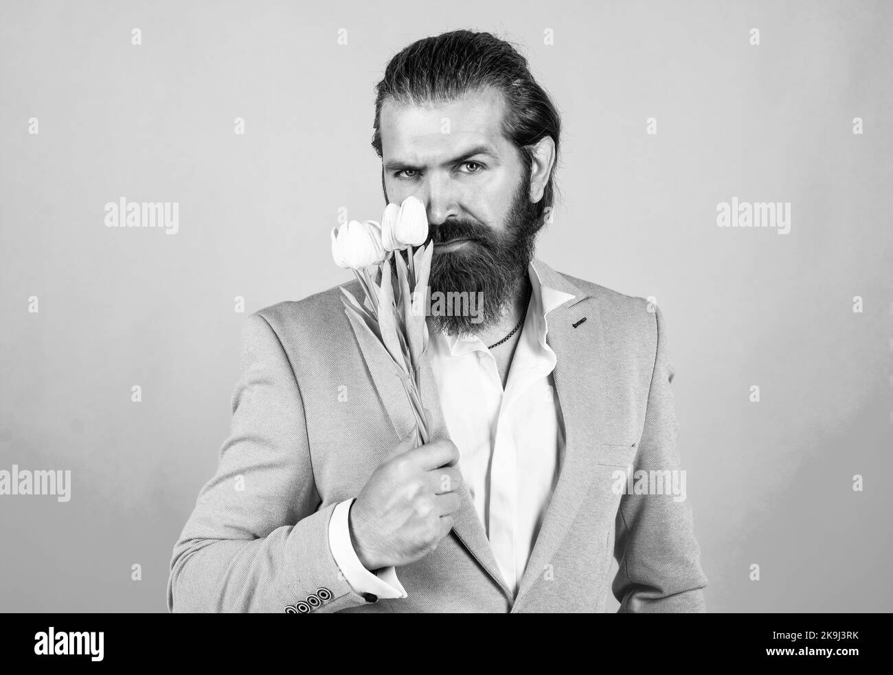 smelling good. brutal handsome man with gift. valentines or womens day ...