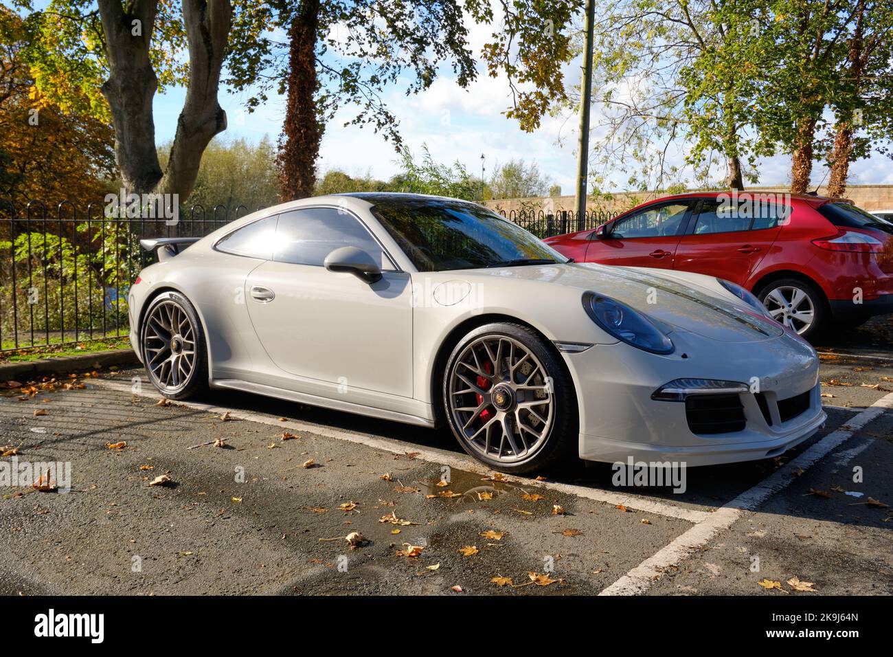 New white Porche sports car in a car park Stock Photo - Alamy