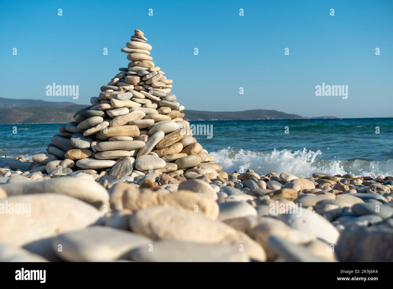 4. a pebble structure on the beach Stock Photo - Alamy