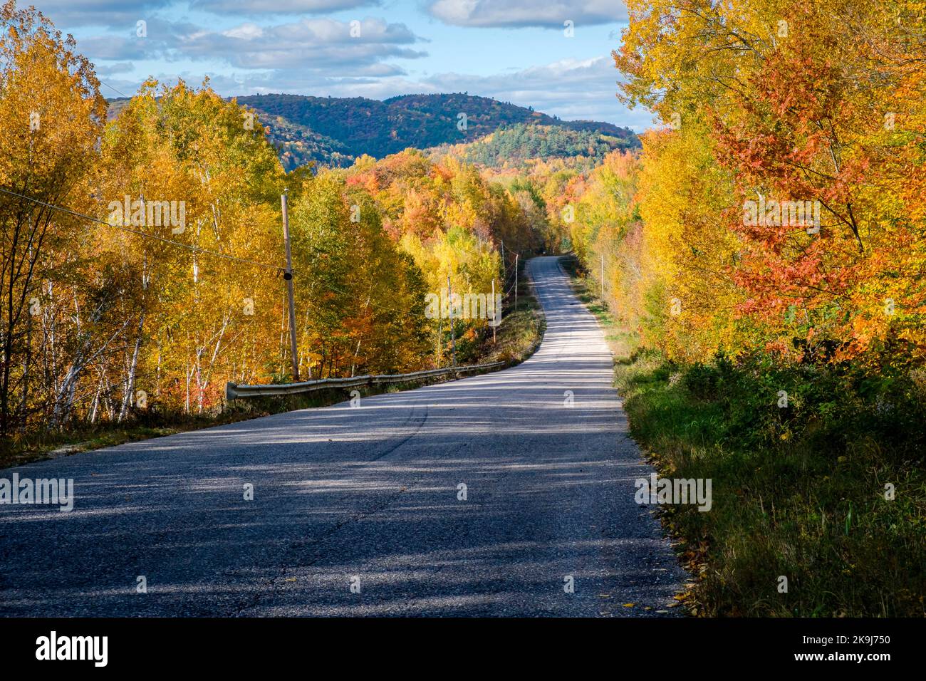 Autumn scene of rural road in Quebec, Canada Stock Photo - Alamy