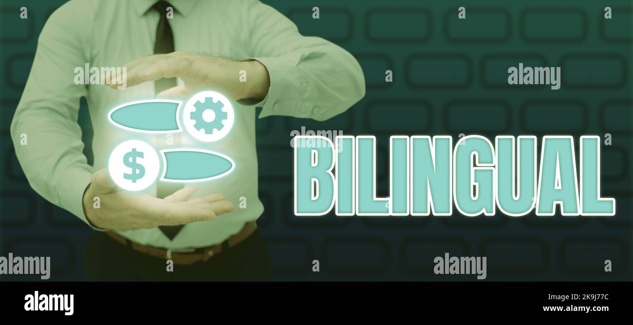 Hand writing sign Bilingual. Word Written on digital database ...