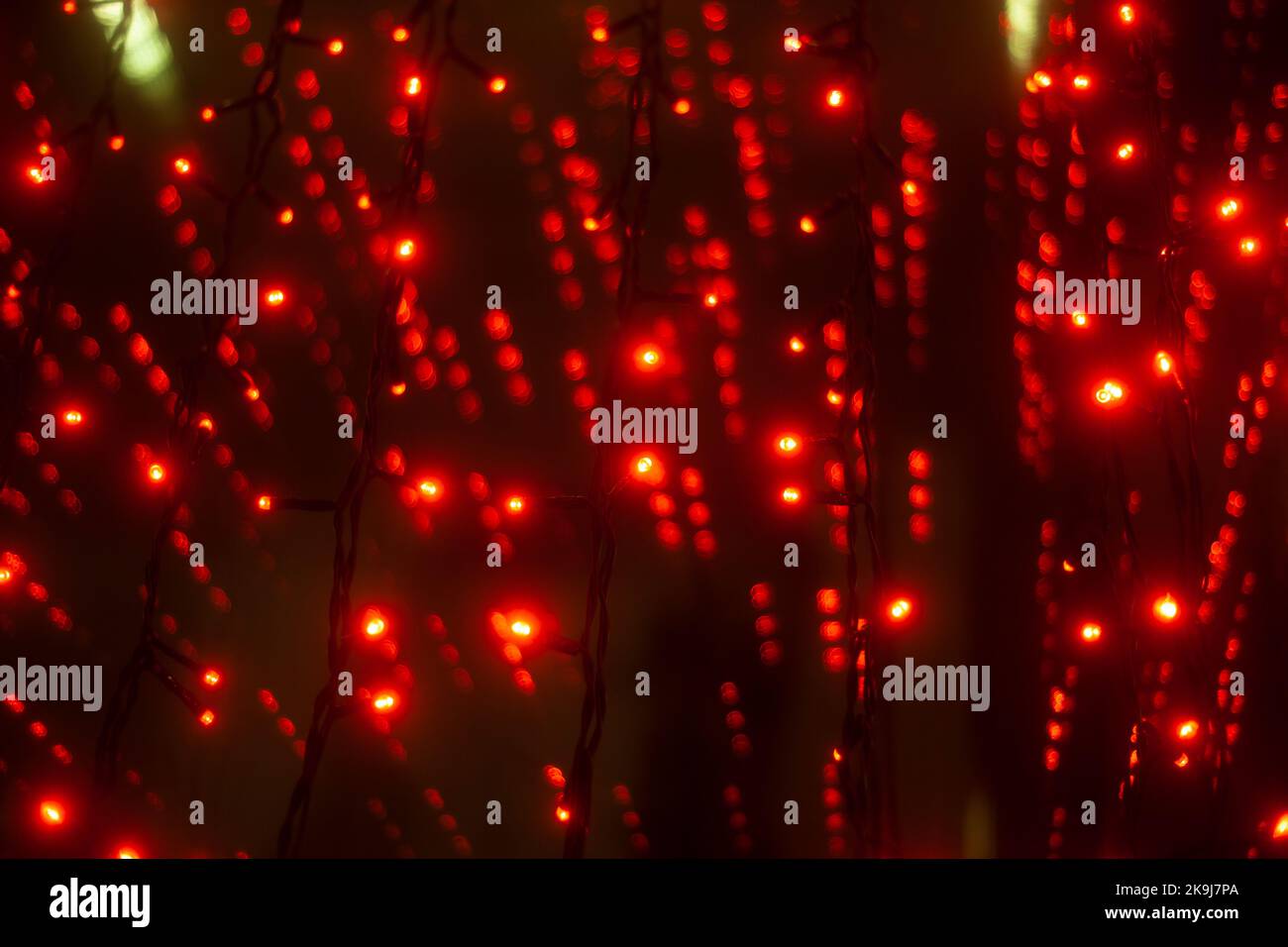 Red lights in dark. Lights on glass. Indoor games. Interior details ...