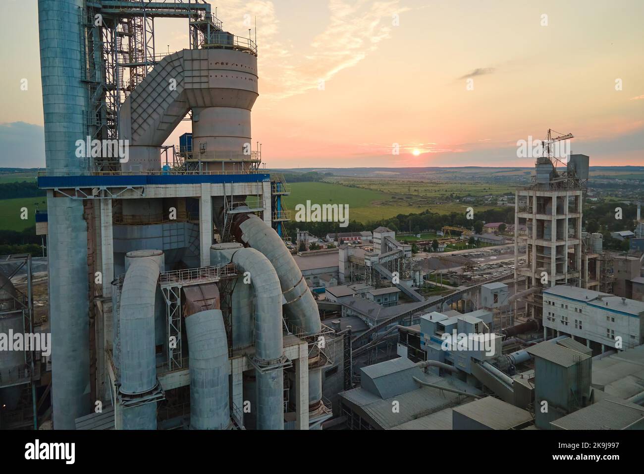 Aerial view of cement factory with high concrete plant structure and ...