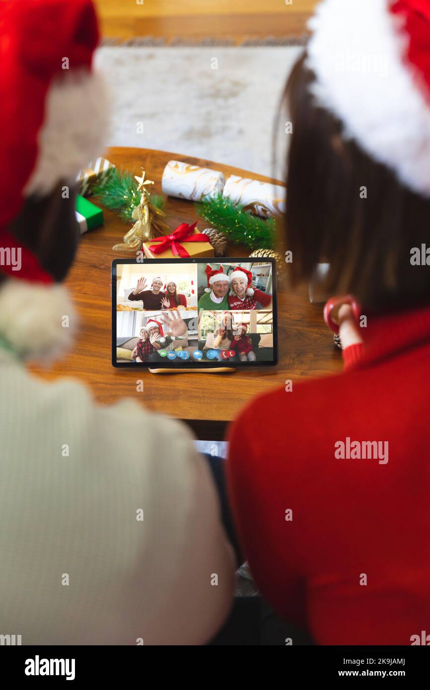 Diverse couple having christmas video call with diverse people Stock ... Diverse couple having christmas video call with diverse people Stock ...