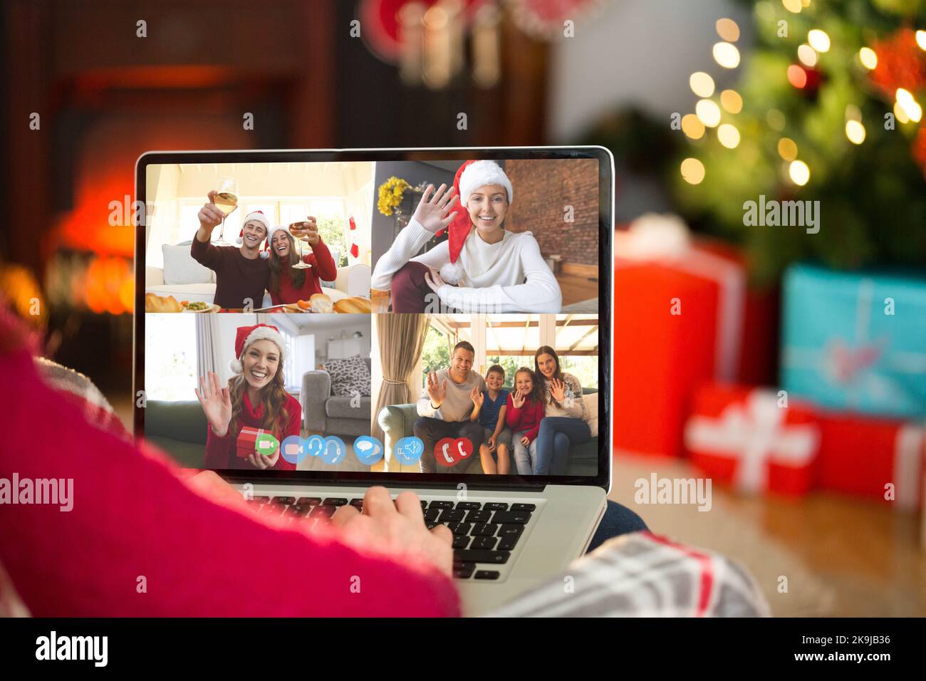 Caucasian woman having christmas video call with diverse people Stock ...