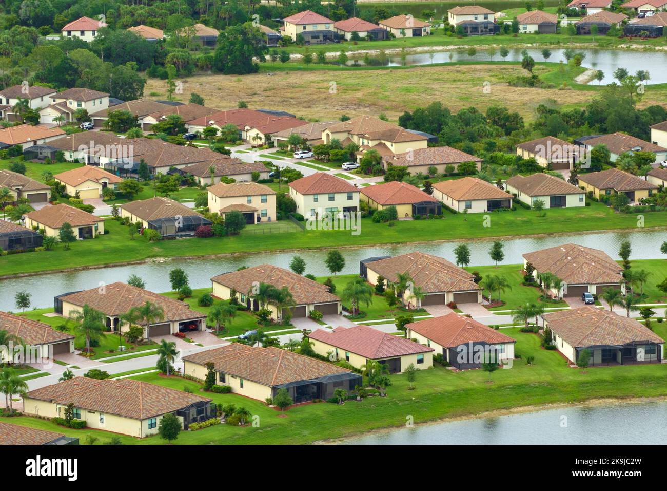 View from above of densely built residential houses in closed living ...