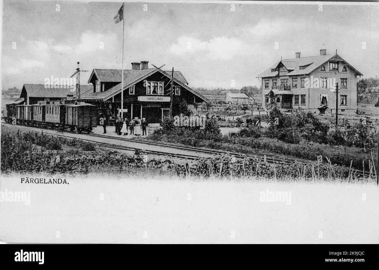 Steam train at station. Narrow tracks 891mm. At the track between ...