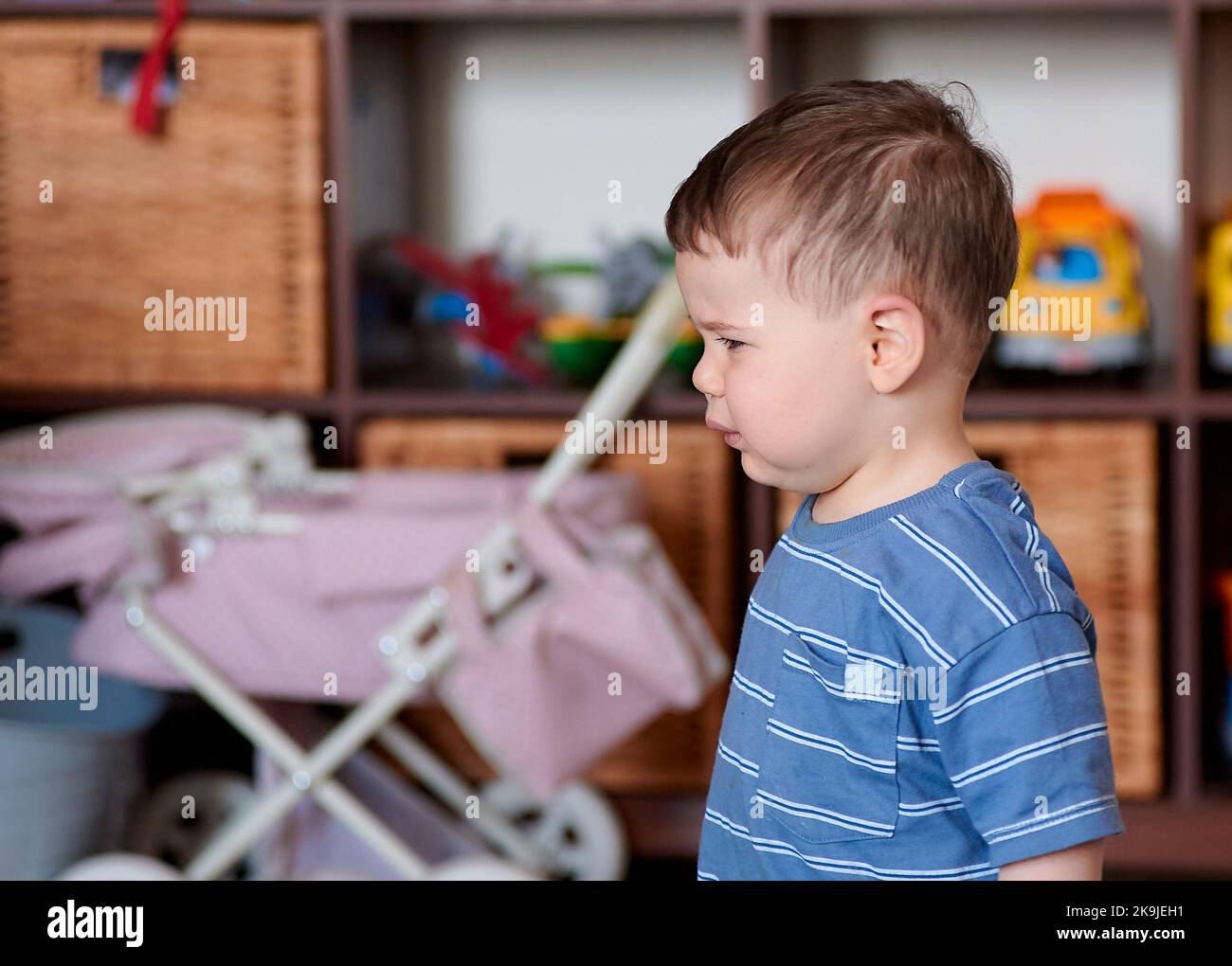 little boy playing with his toys and toy computer Stock Photo - Alamy