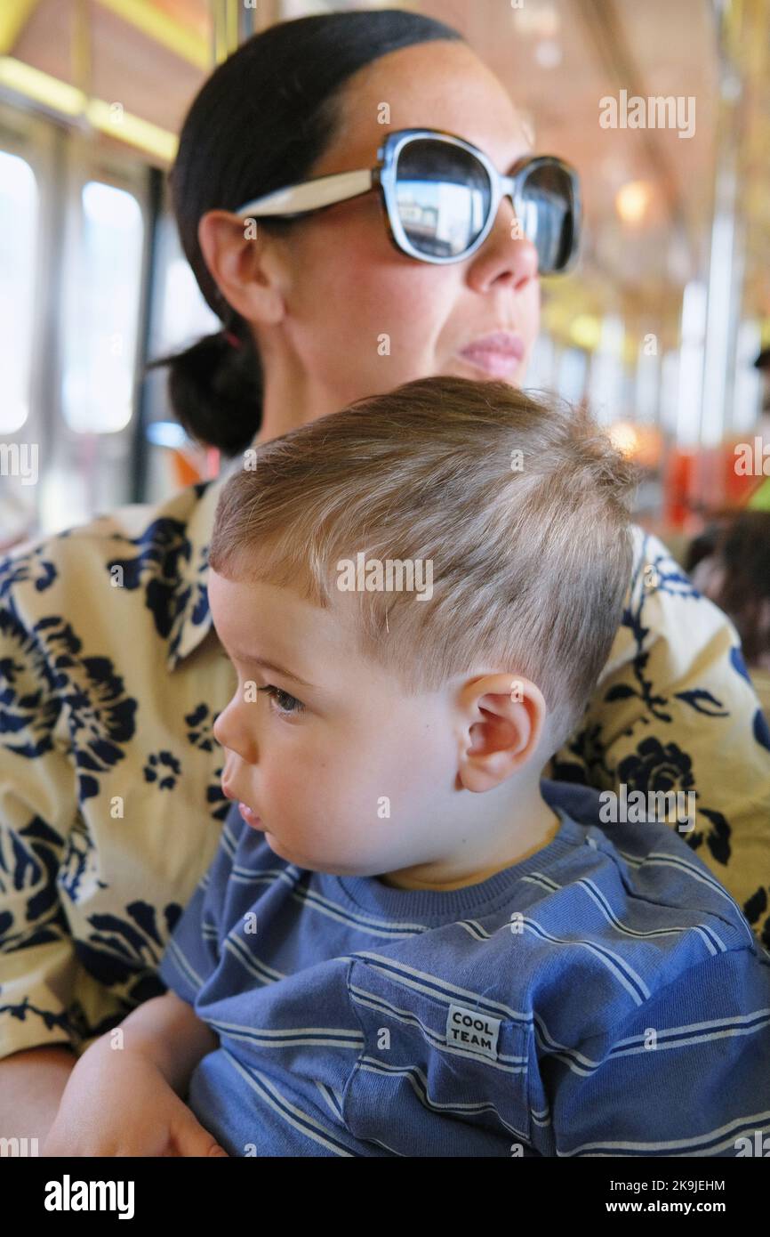 Baby on train seat hi-res stock photography and images - Alamy