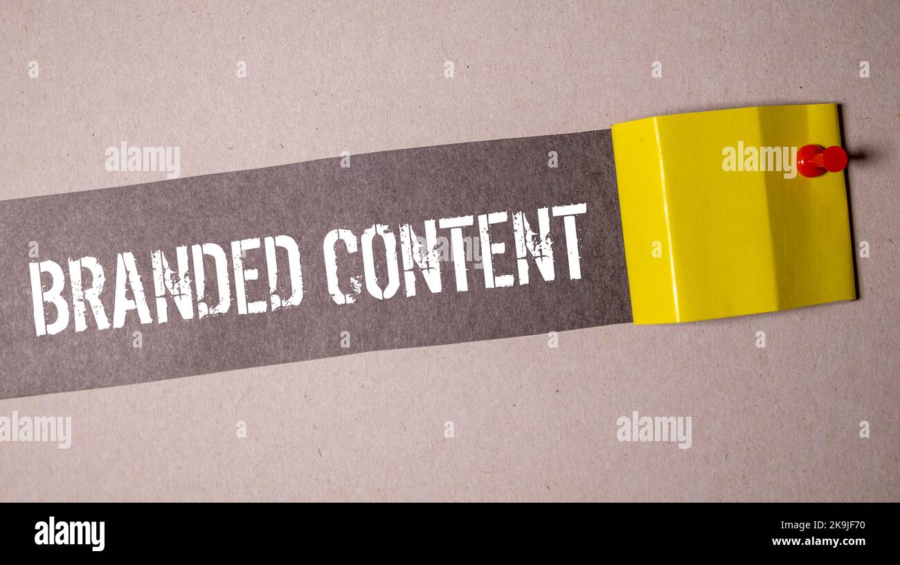 Business concept.Text Branded Content writing on notepaper with paper ...