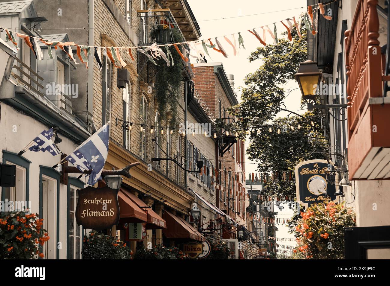 Street lights with banners hi-res stock photography and images - Alamy