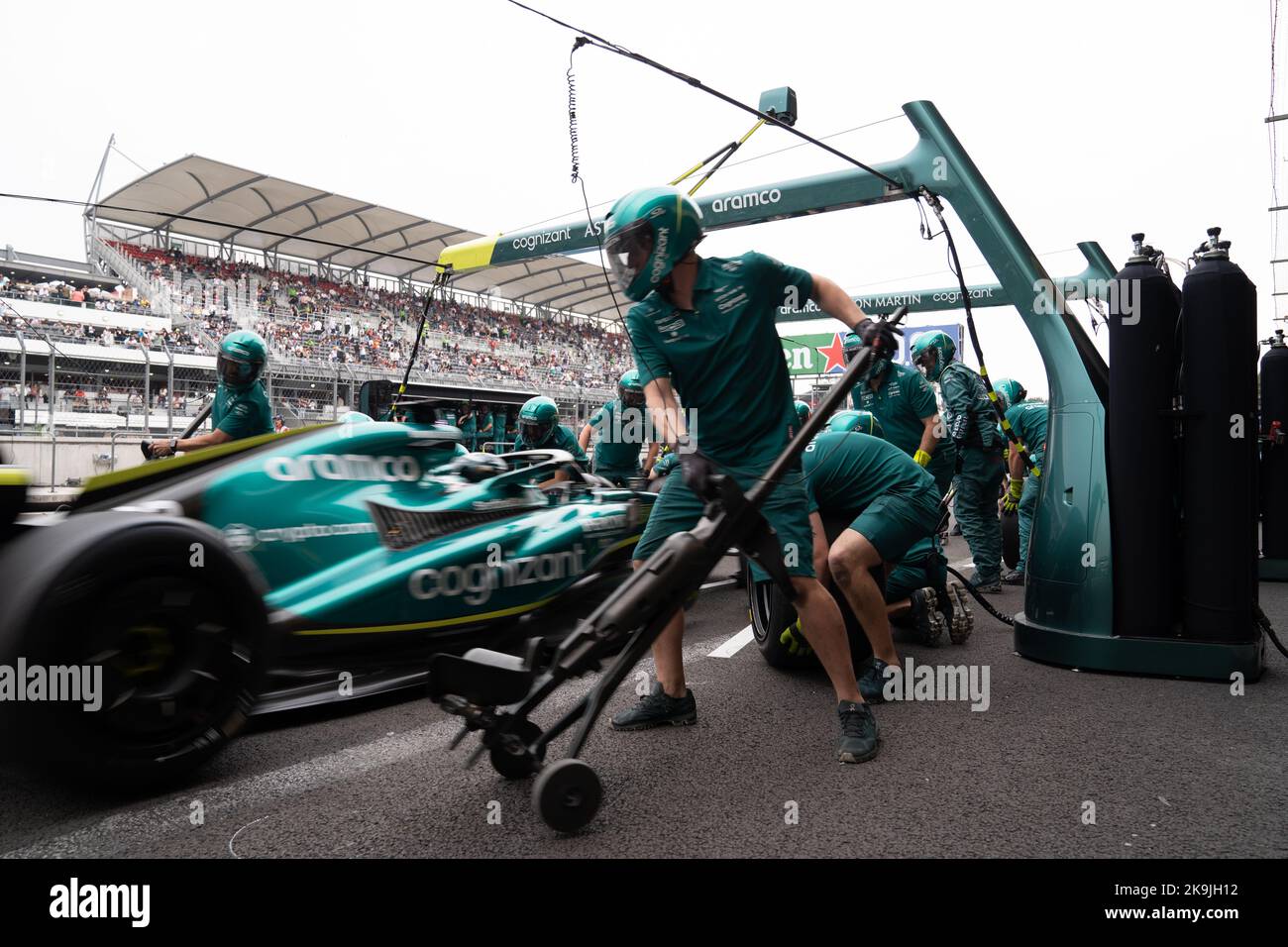Mexico City, Mexico. 28th Oct, 2022. the Aston Martin pit stop team work on one of their cars ...