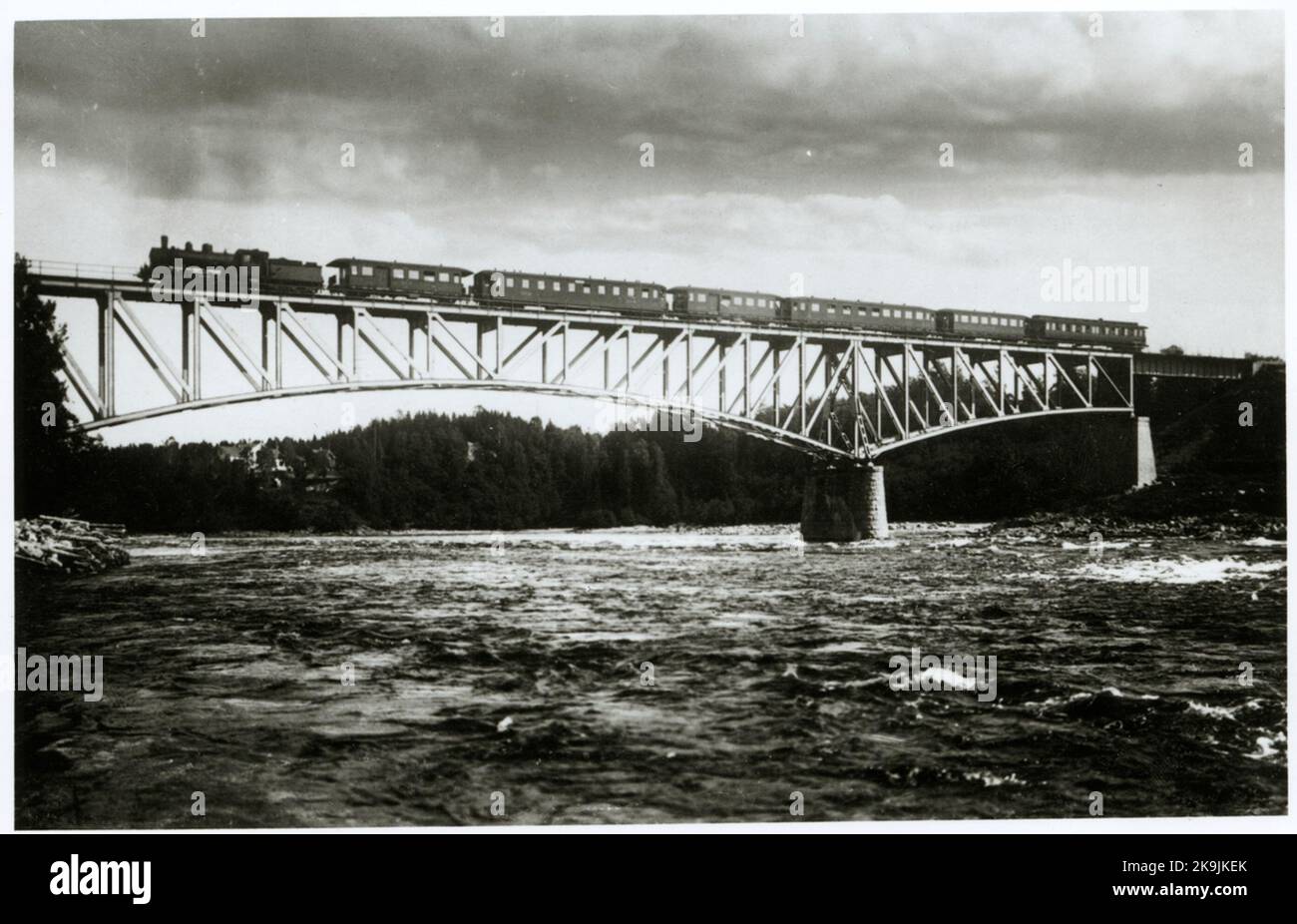 The east coast line OKB, locomotive on railway bridge over the ...