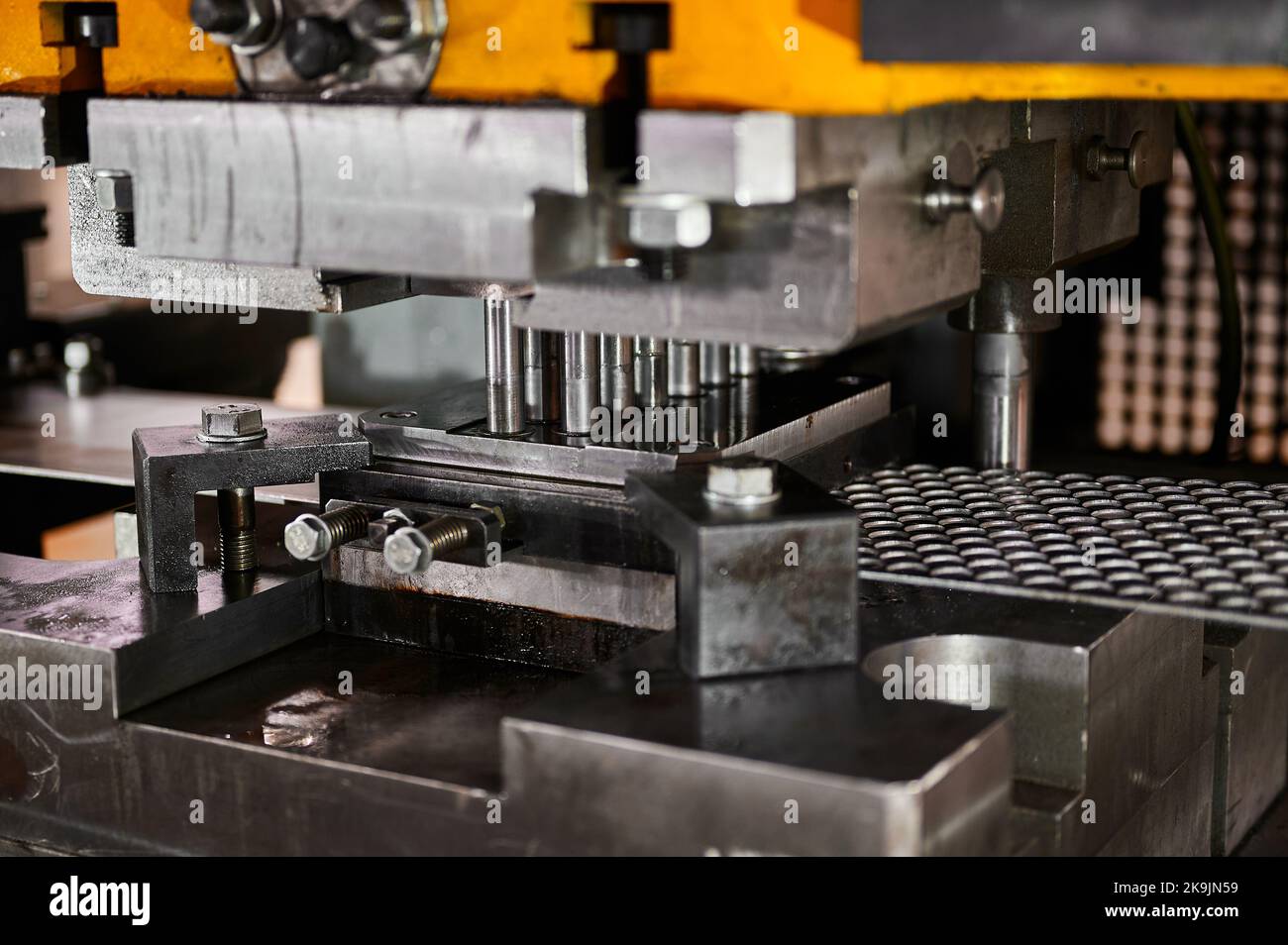 Cutting of steel blanks from metal strip on stamping press Stock Photo ...