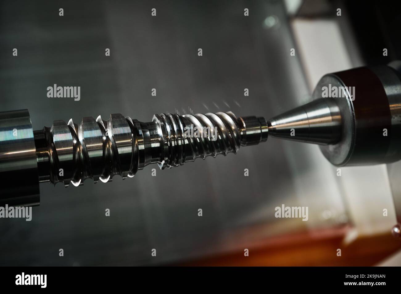 Milling machine tool operates with metal workpiece at plant Stock Photo ...