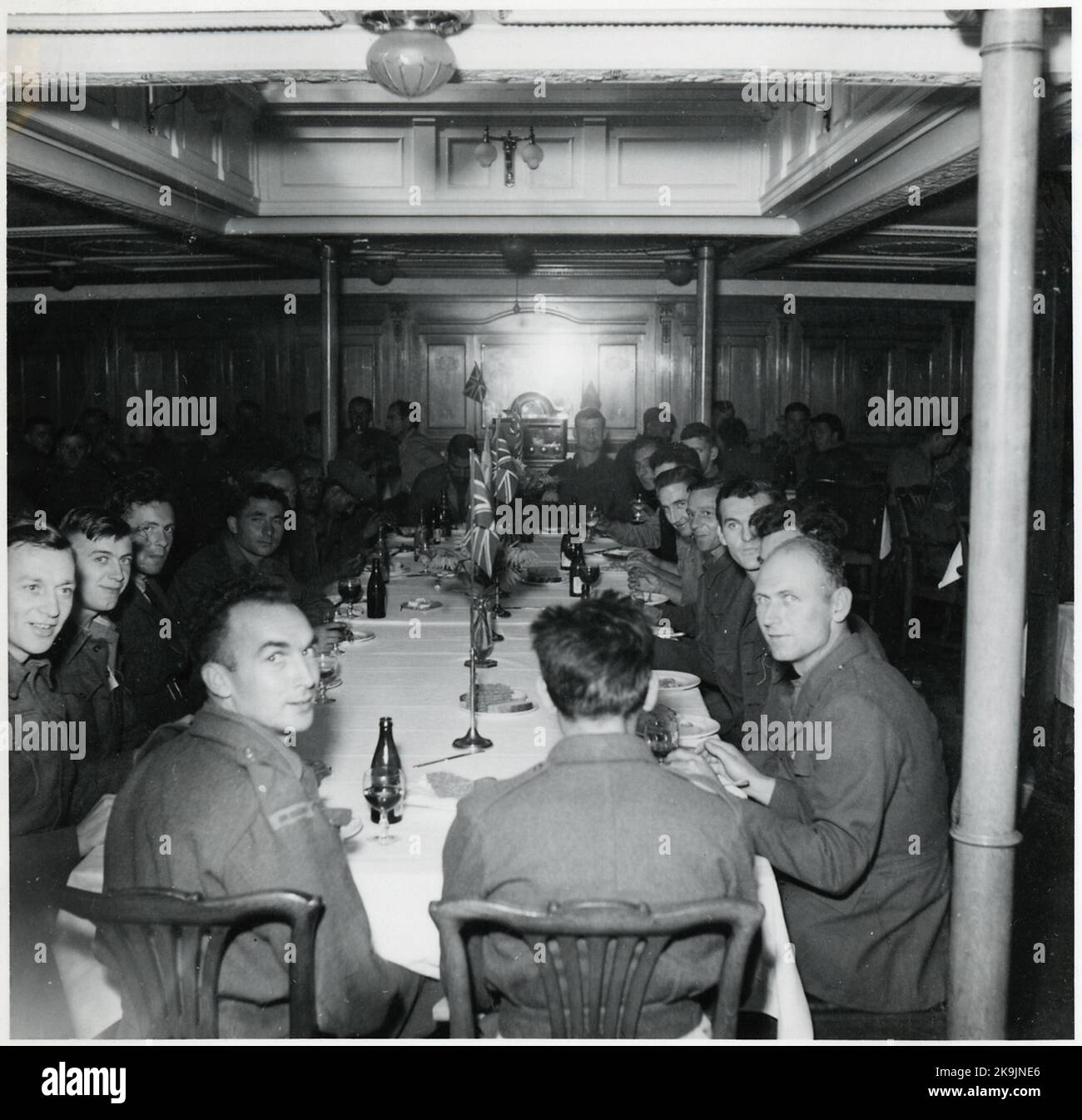 English prisoners of war are served breakfast aboard Queen Victoria ...