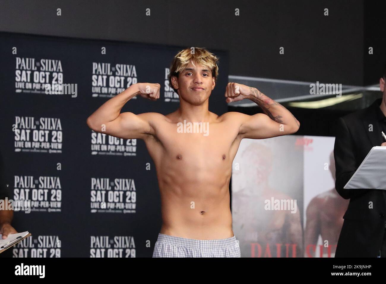 GLENDALE, AZ - OCTOBER 28: Boxer Adrian Rodriguez steps on the scale during the Official Weigh ...