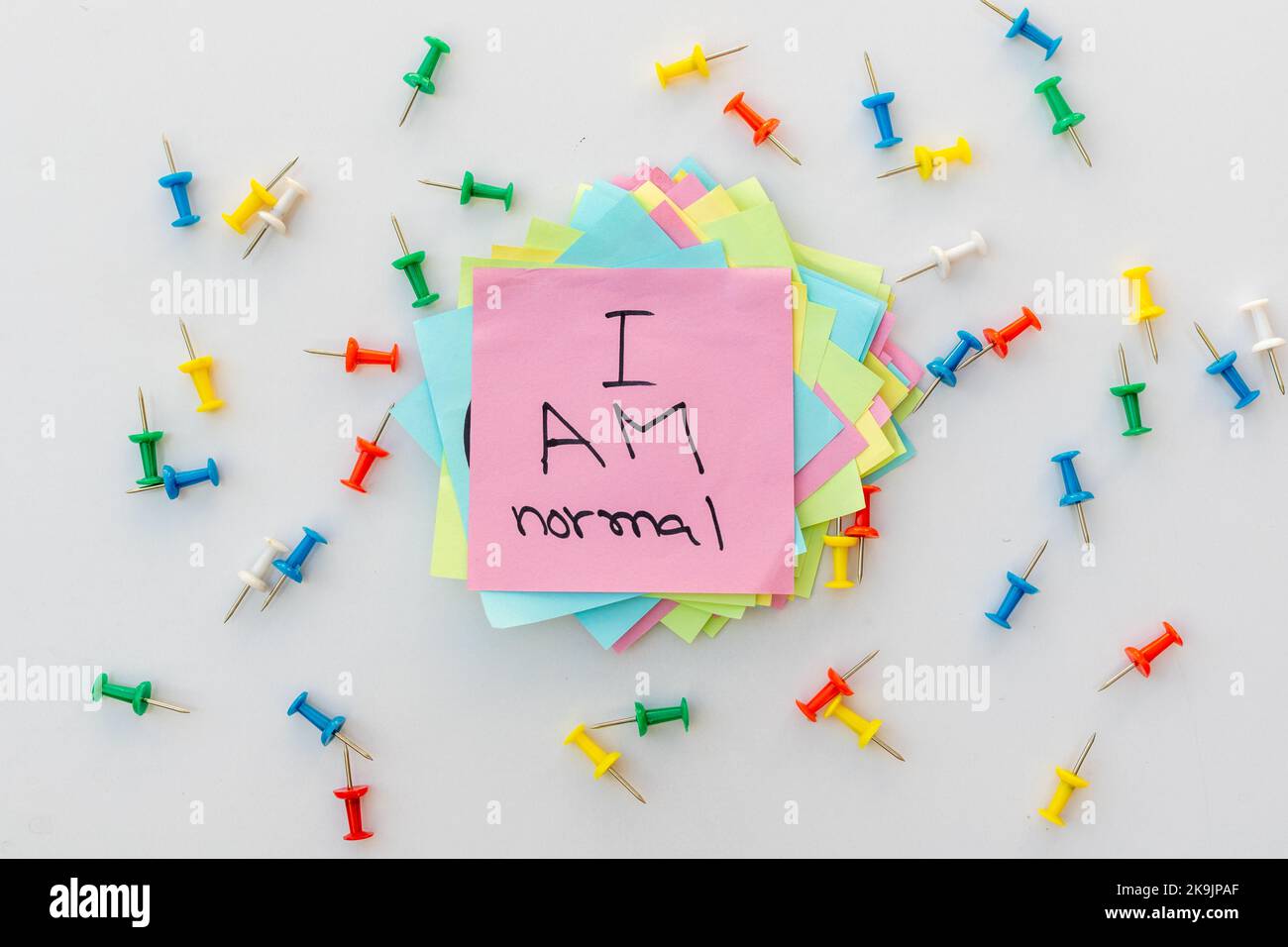 I am normal phrase handwritten on a sticky note Stock Photo - Alamy