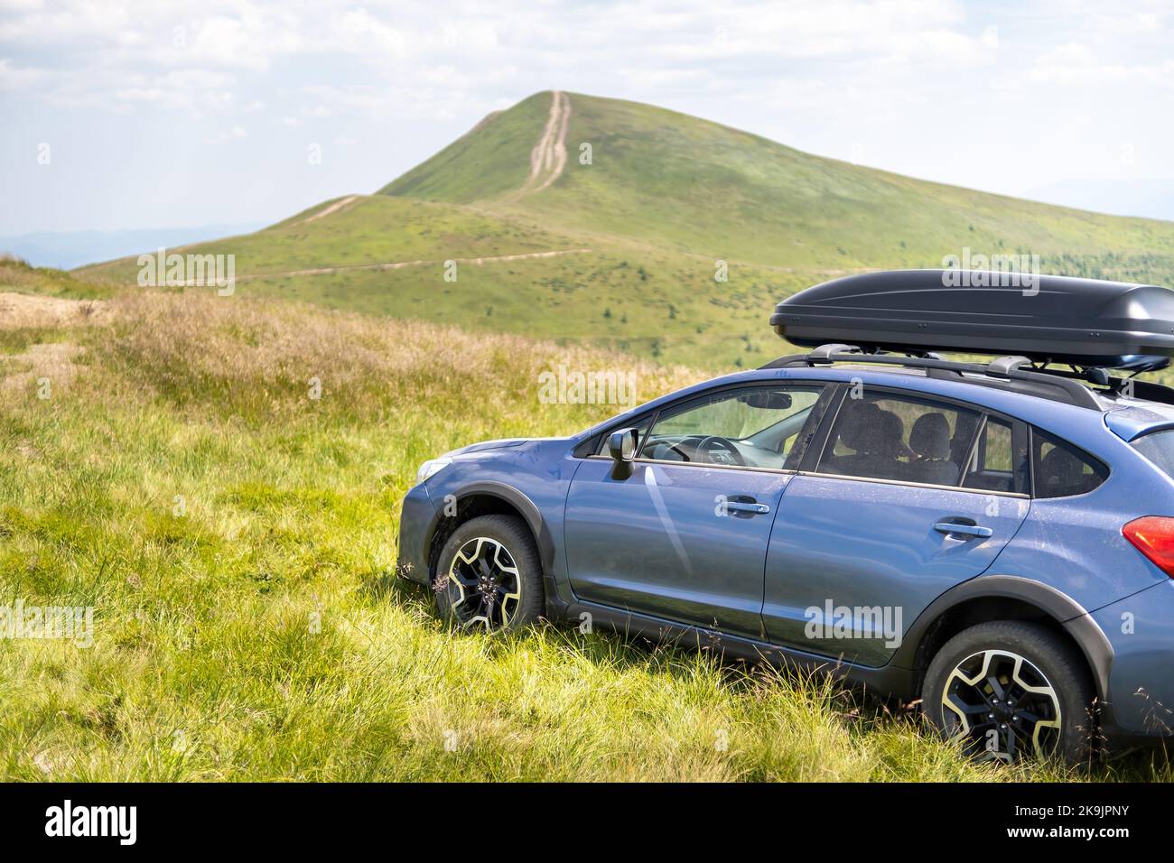 Blue off road car on mountain trail. Traveling by auto, adventure in ...