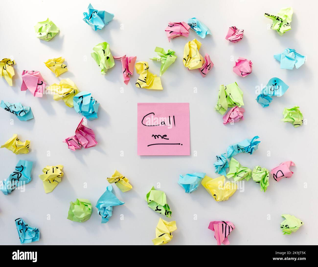 Call me reminder note handwritten on a pink sticky note with beautiful ...