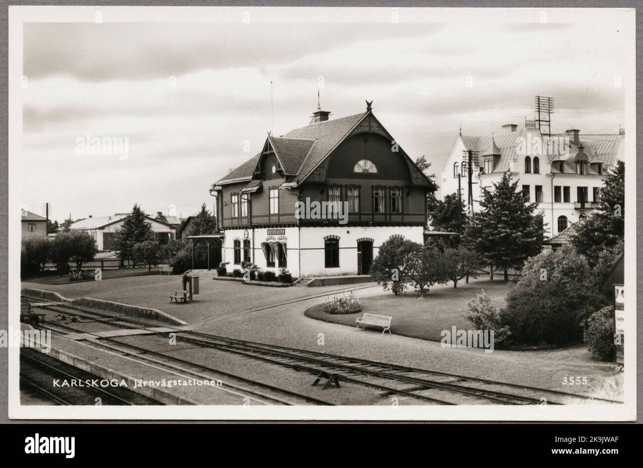 Track side of station with buildings in the background Stock Photo - Alamy