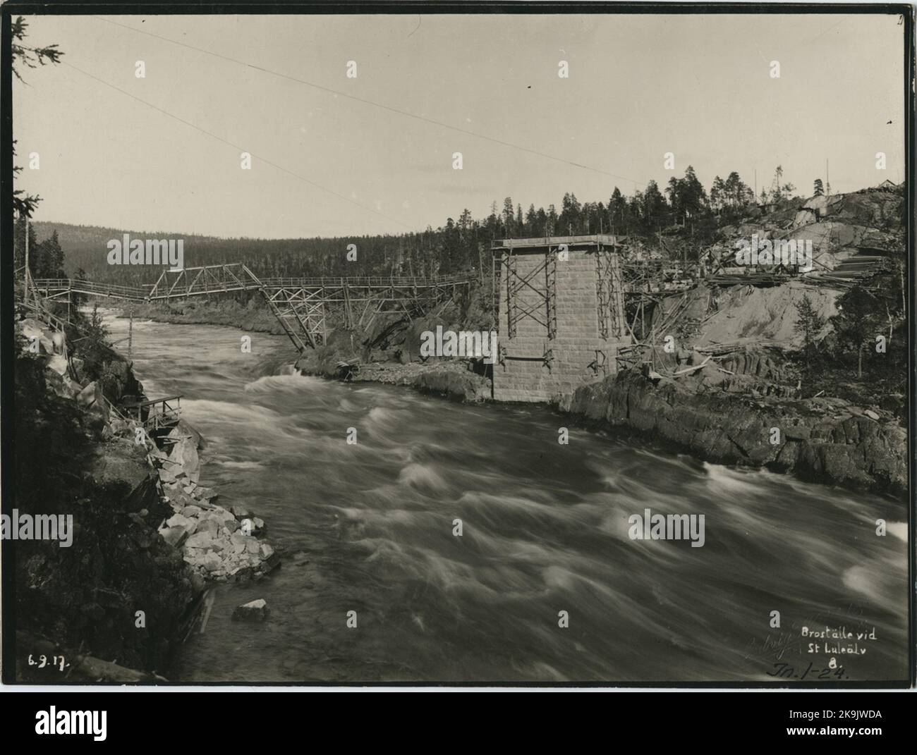 Railway bridge construction at Stora Lule River. Provisional road ...