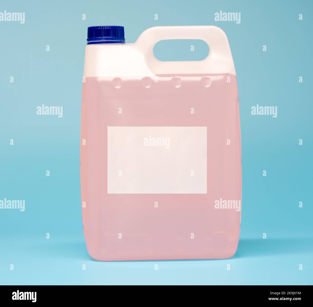 plastic transparent canister with liquid gasoline or car oil with empty ...