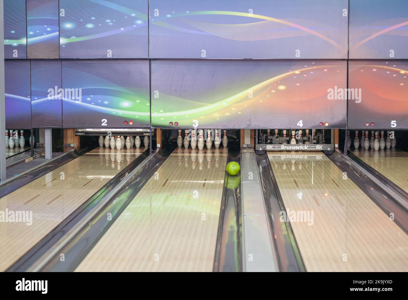 Paths with balls and pins for bowling. A fun game for the company Stock ...