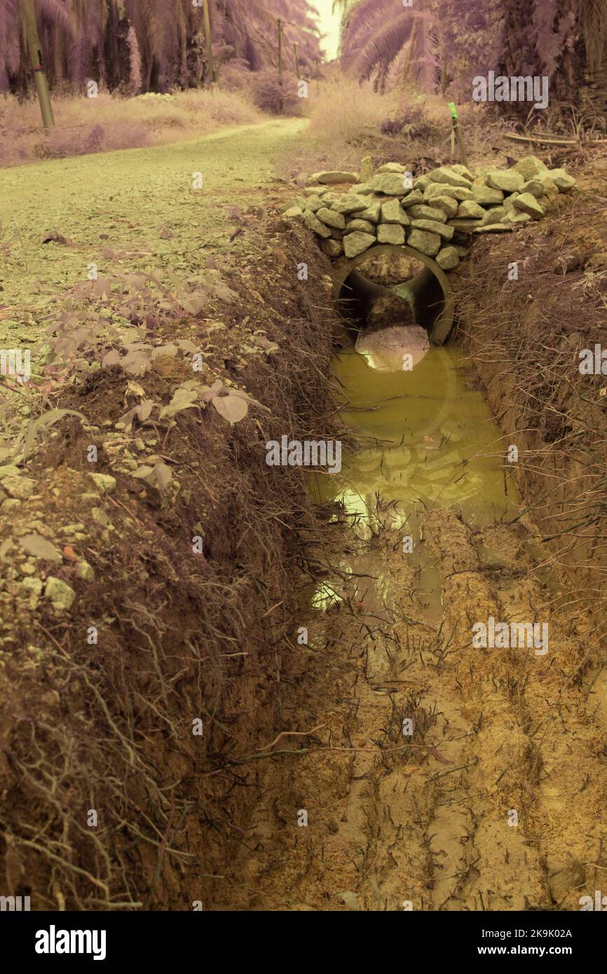 infrared image of the concrete cylindrical drain at the countryside ...