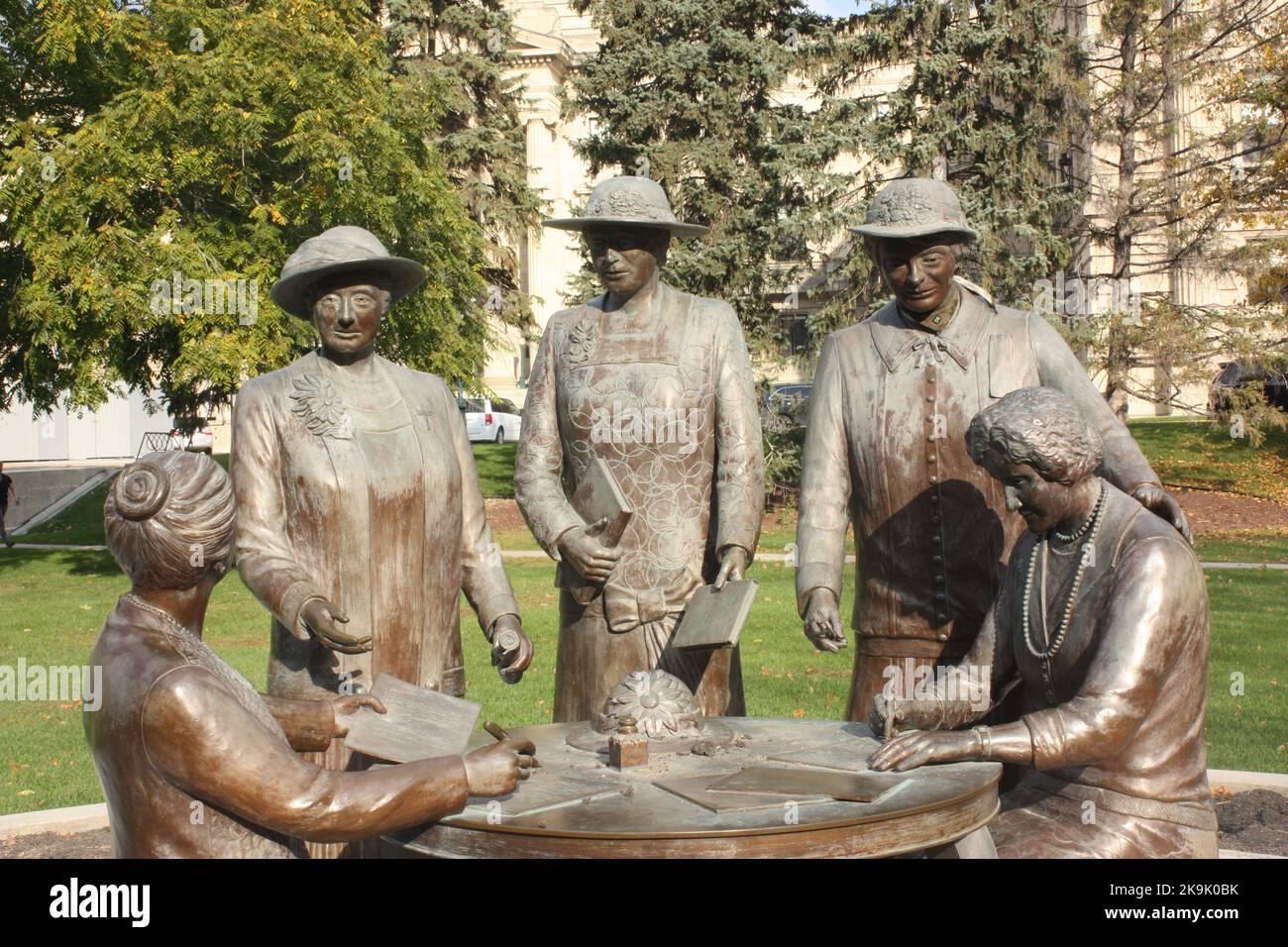 A statue of the Famous Five women in front of the legislature building ...