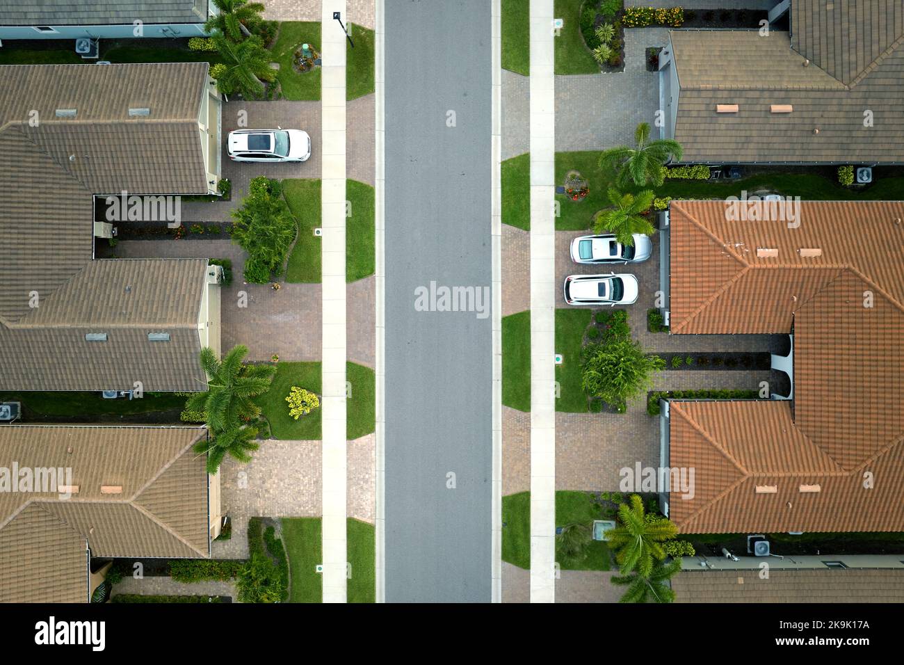 Aerial view of tightly located family houses in Florida closed suburban ...